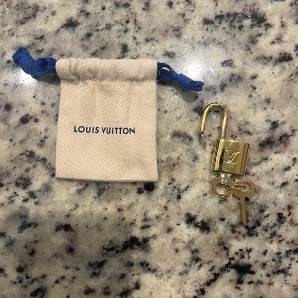 Louis Vuitton | Jewelry | Louis Vuitton Gold Lock | Poshmark